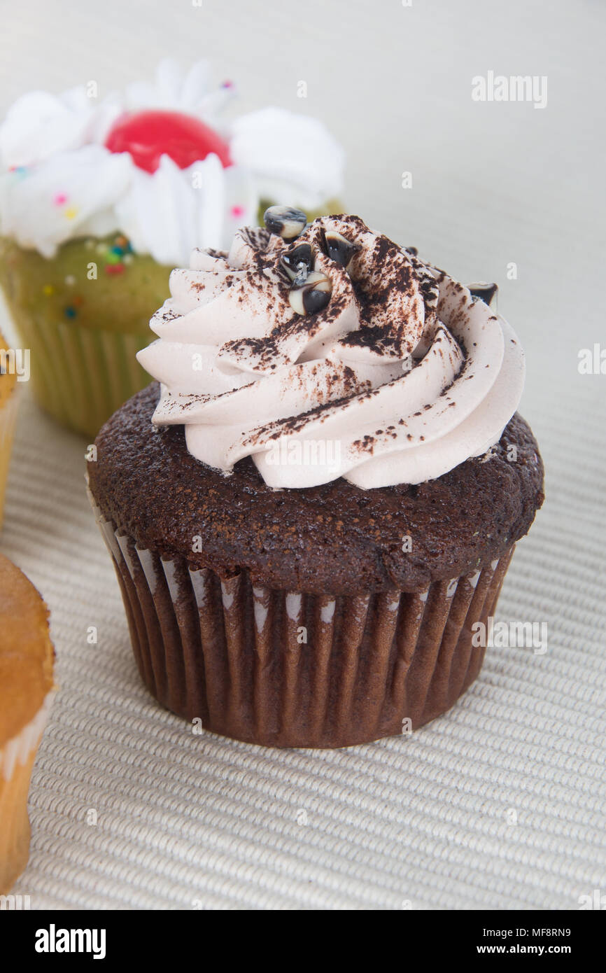 cupcake. chocolate cupcakes on the background Stock Photo - Alamy