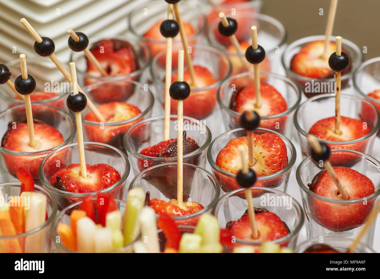 Catering food table of various appetizers, snacks and canapes Stock ...