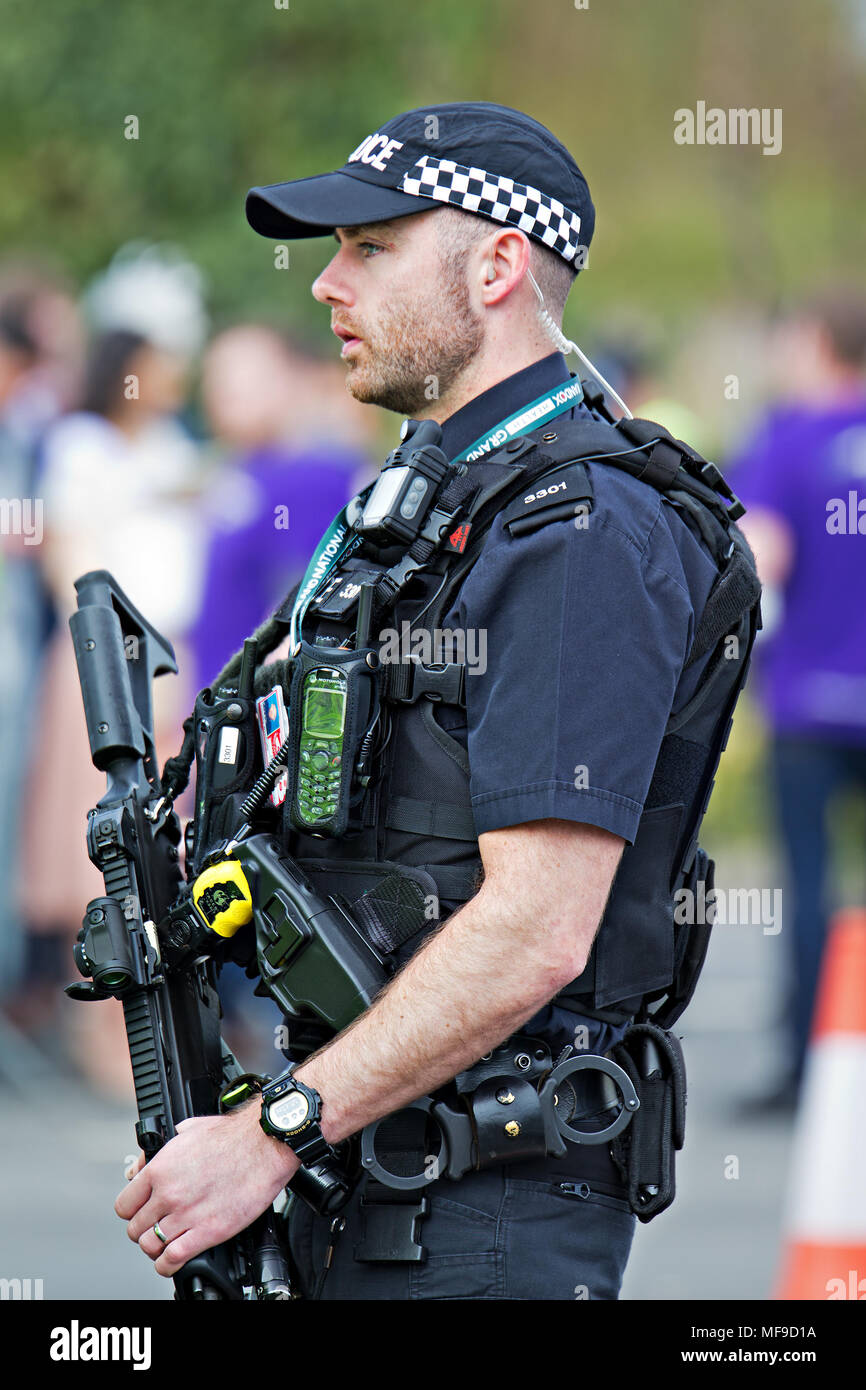 Heavily armed UK police officers on duty at the Aintree Grand National ...