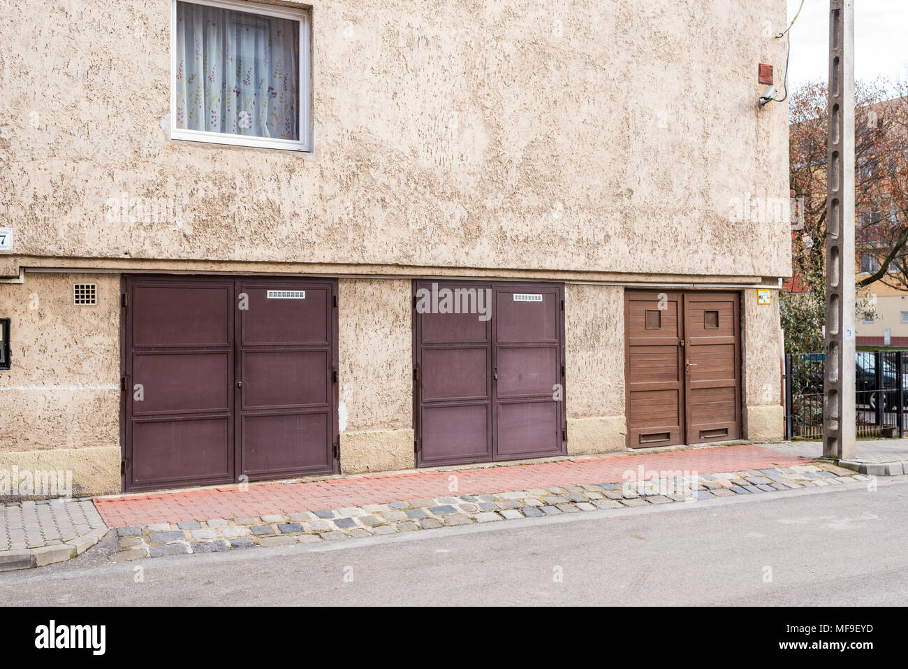 metal gate of garages for cars Stock Photo - Alamy