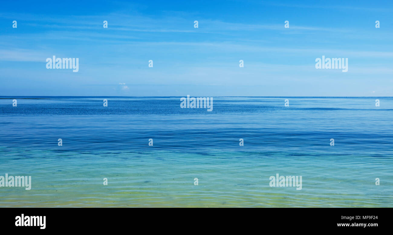 Azure blue sea Bali Sea off Lombok Indonesia Stock Photo - Alamy