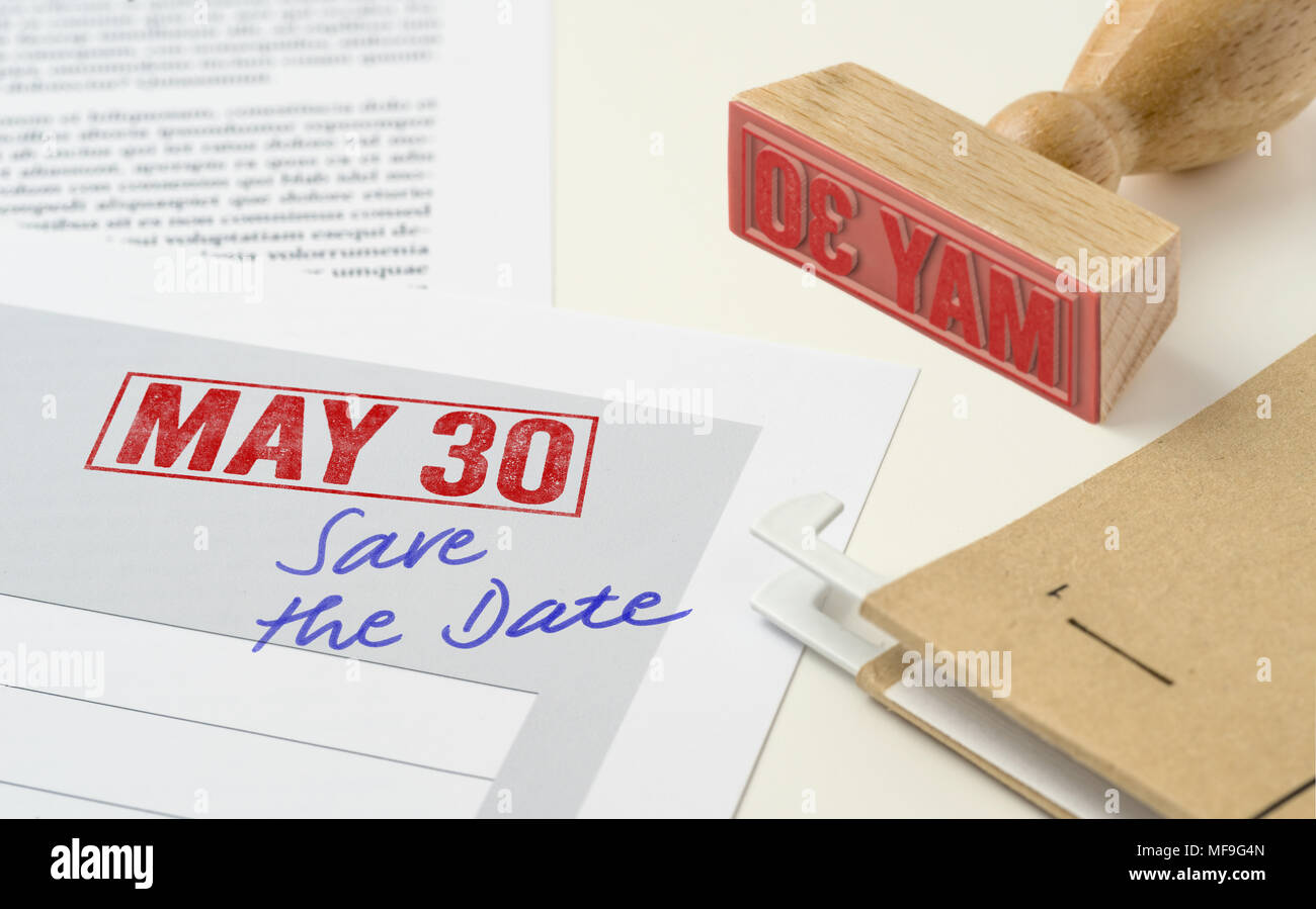 A red stamp on a document - May 30 Stock Photo - Alamy