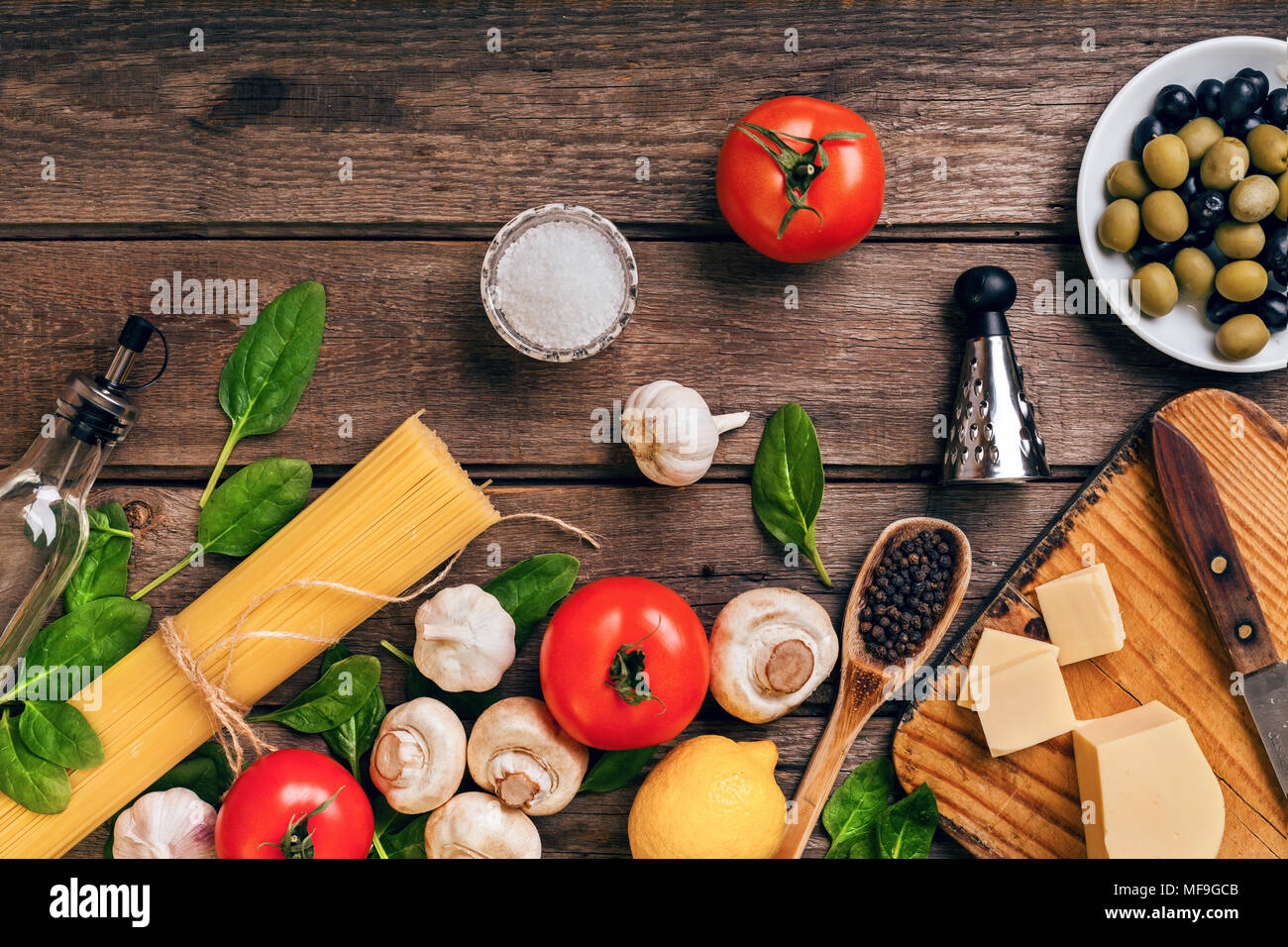 Italian food background with pasta, spices and vegetables. Top view ...