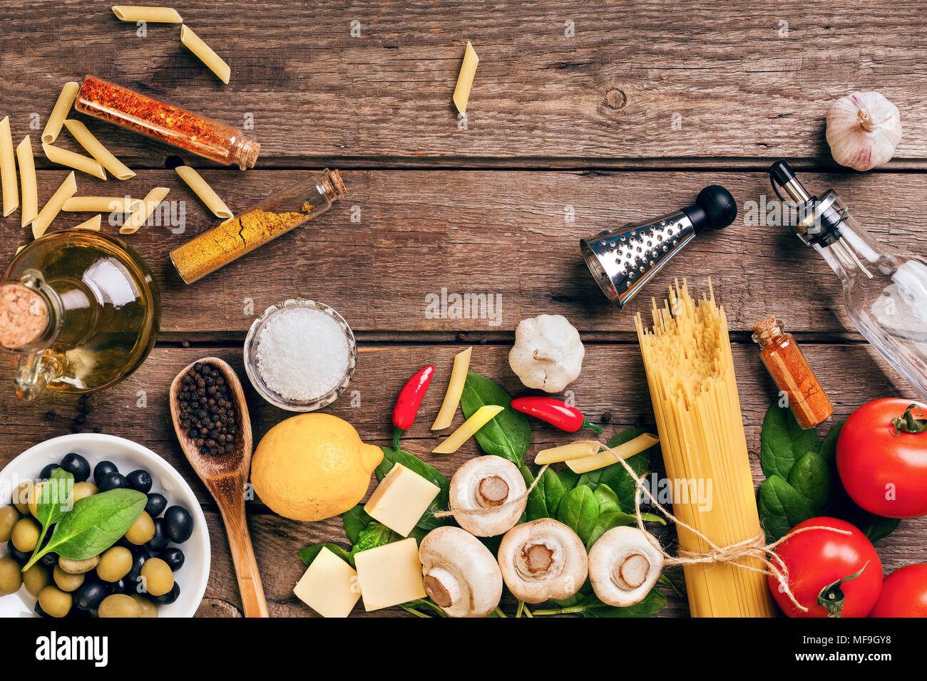 Italian food ingredients for the preparation pasta on wooden background ...