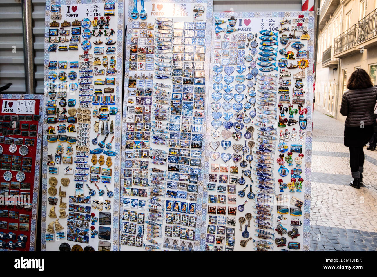 A shop in downtown Porto, Portugal, has tourist souvenirs on display ...