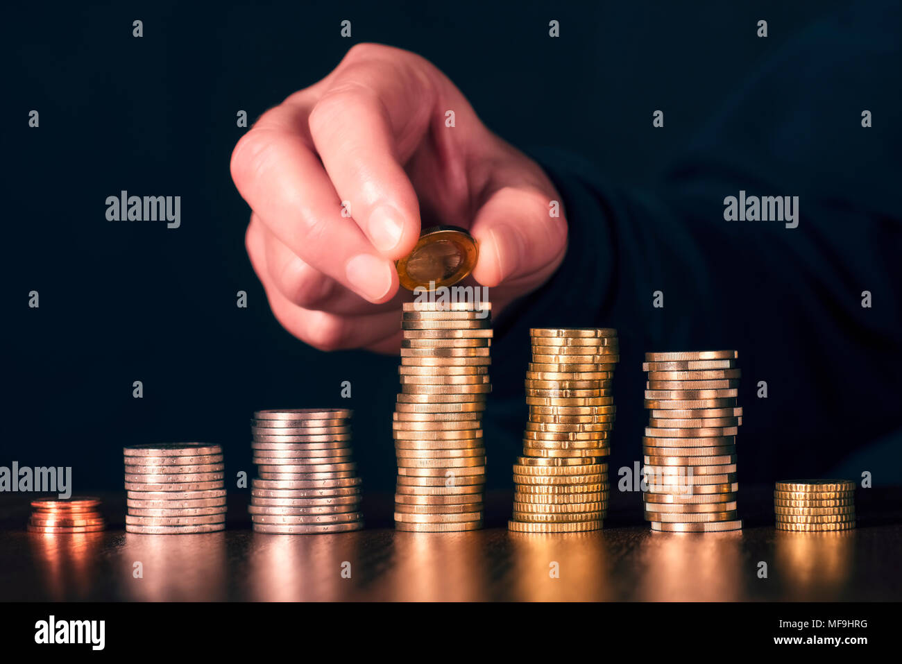 Pile of foreign coins hi-res stock photography and images - Alamy