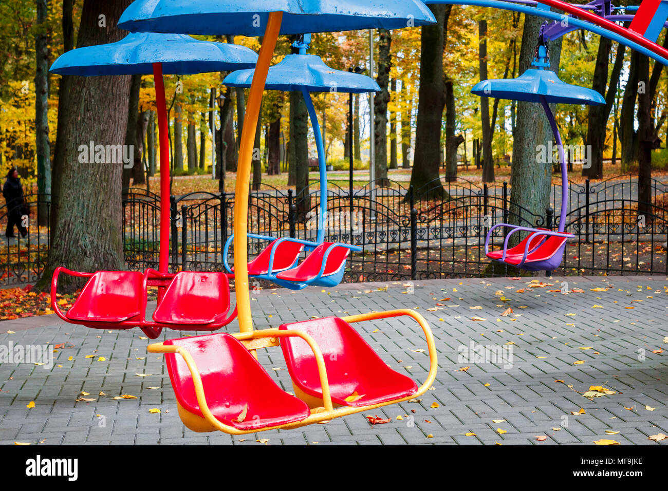 Empty Carousel With Seats Suspended On Chains Without People Waiting ...