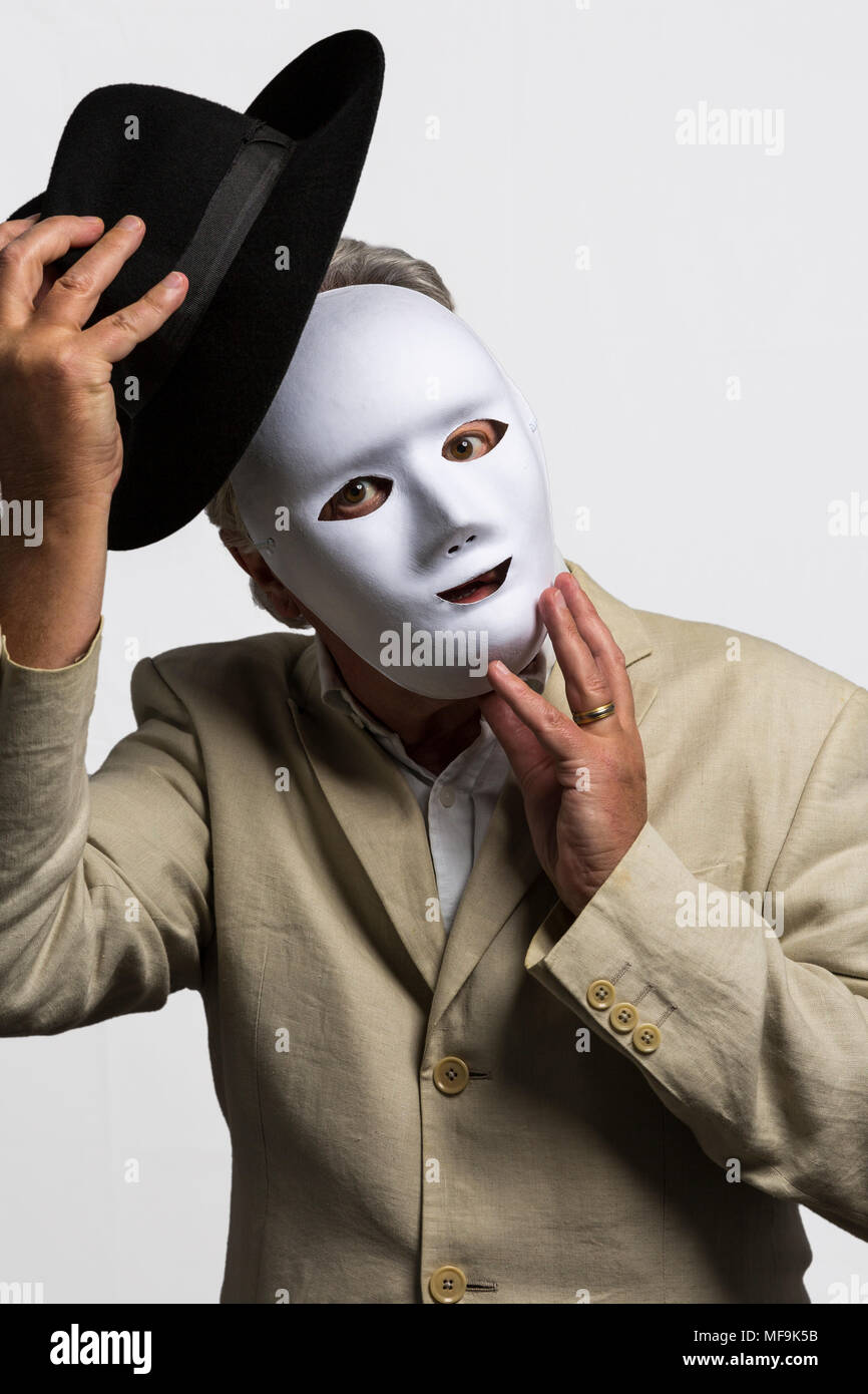Men wearing anonymous masks hi-res stock photography and images - Alamy