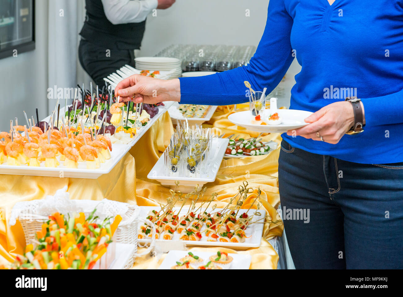 Catering buffet table with food and snacks for guests of the event ...