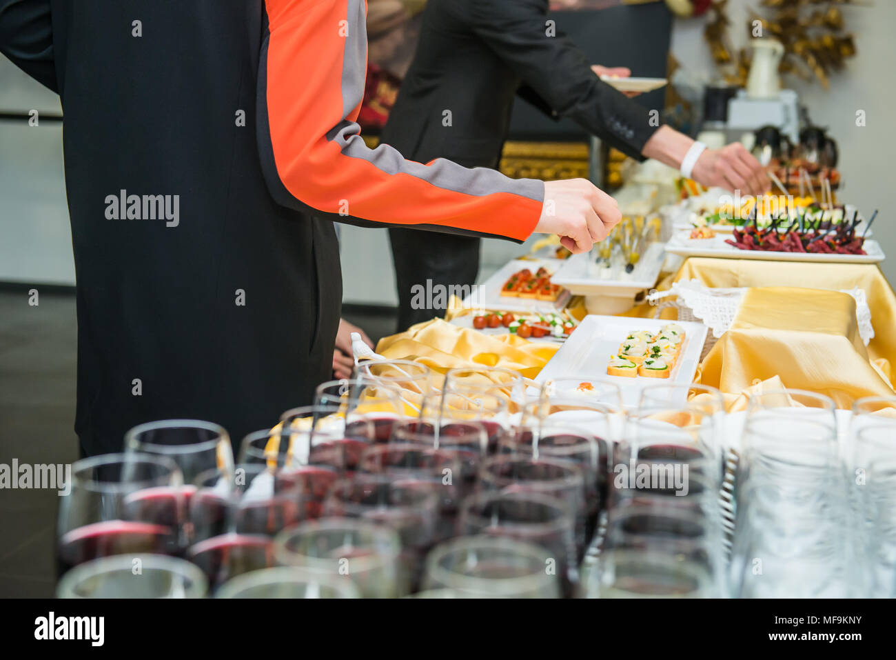 Catering buffet table with food and snacks for guests of the event ...