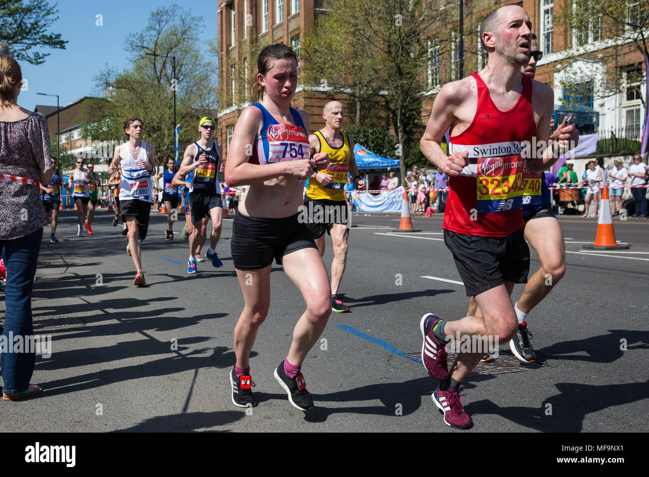 London, UK. 22nd April, 2018. Clara Evans (l, Cardiff AAC) and Stuart ...