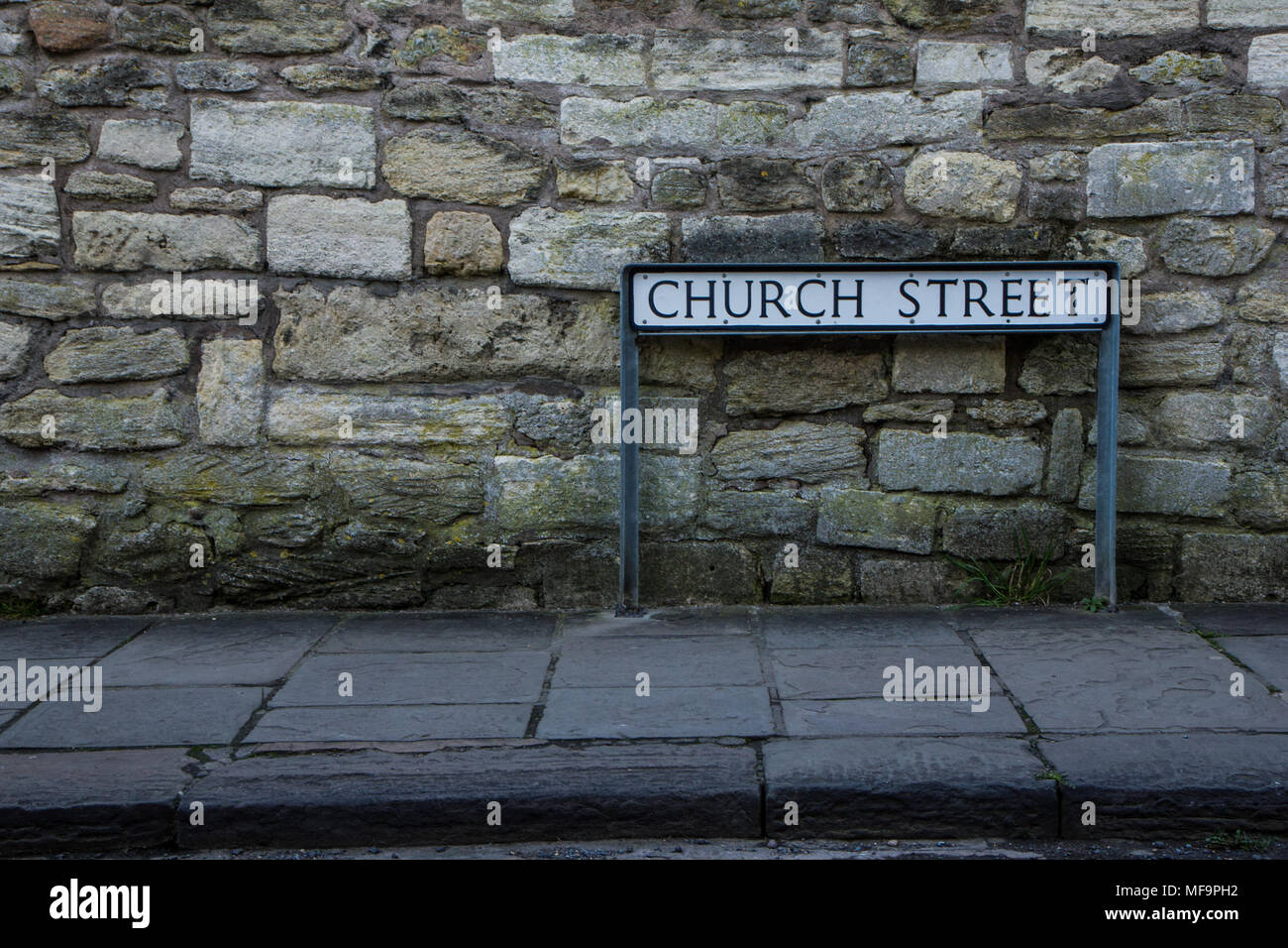 The traditional British road sign, the sign with the street´s name ...