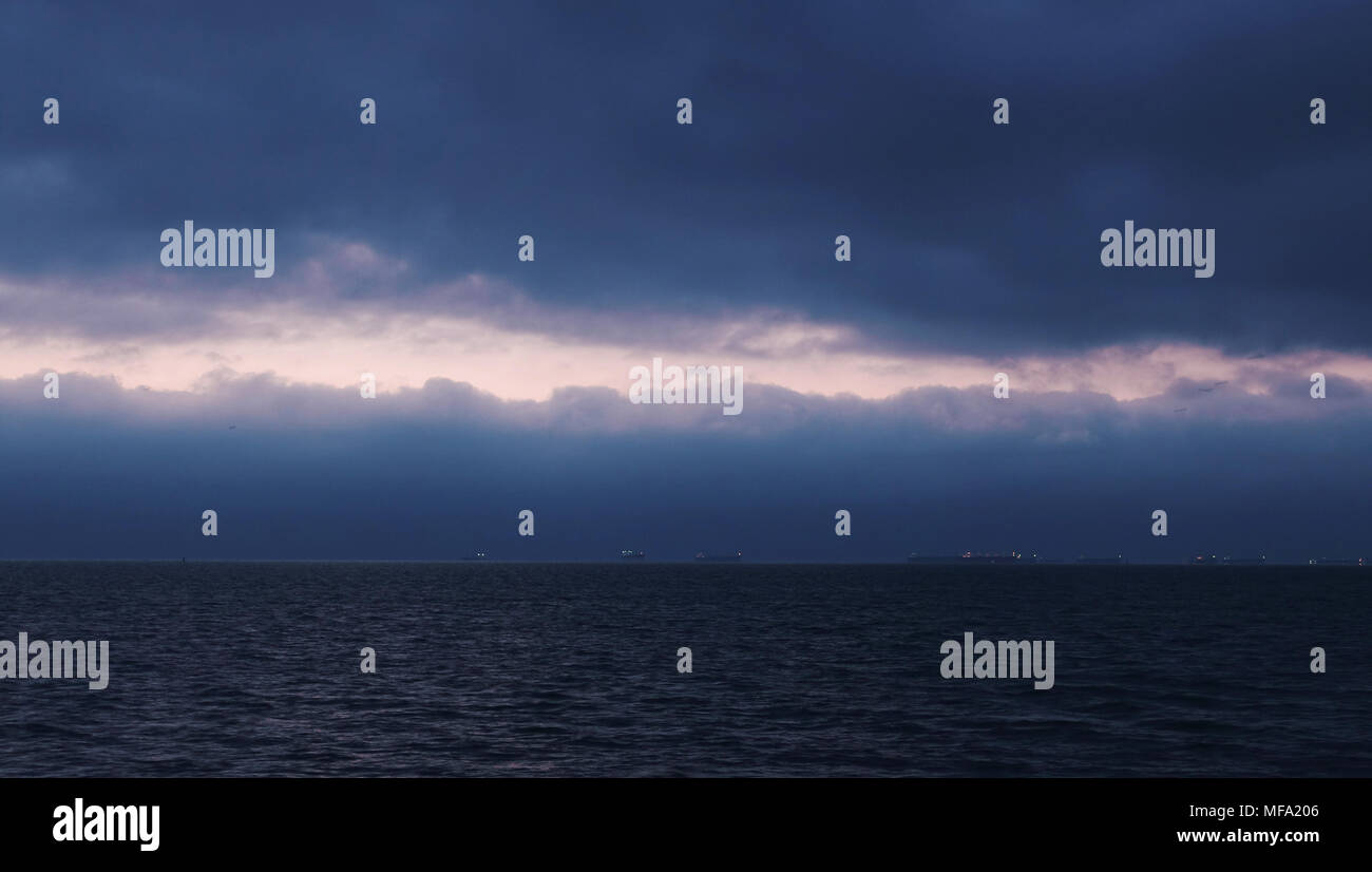 Storm comes over ocean. Ocean view and ships in distance Stock Photo ...