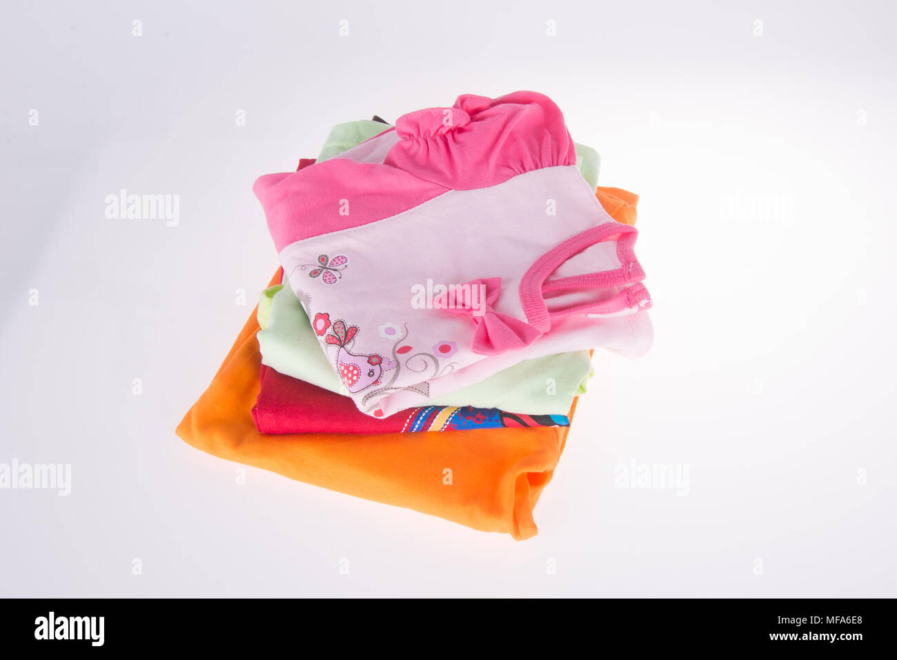 baby clothes on a background Stock Photo - Alamy
