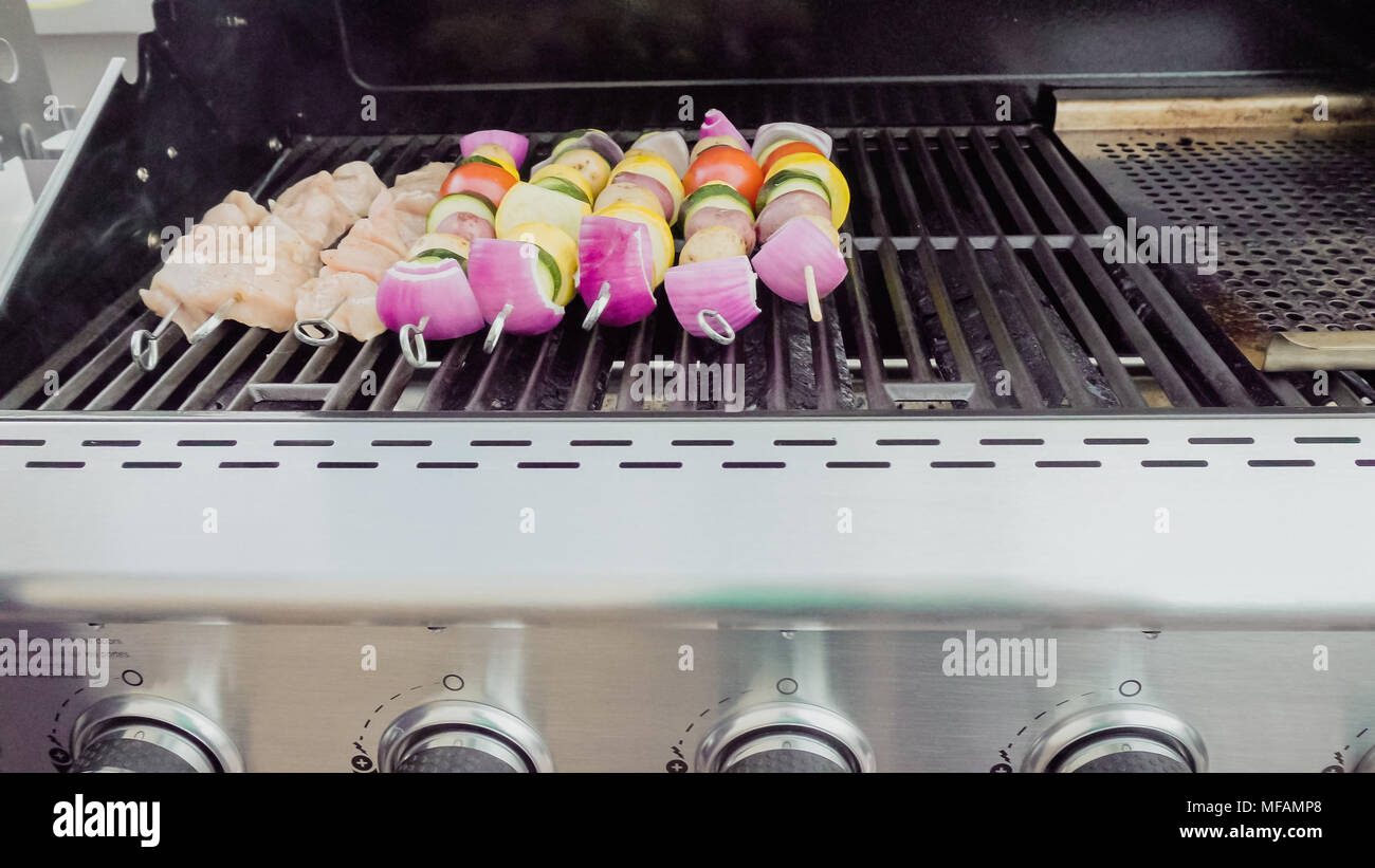 Step by step. Step by step. Grilling veggie skewers and chicken kebabs ...