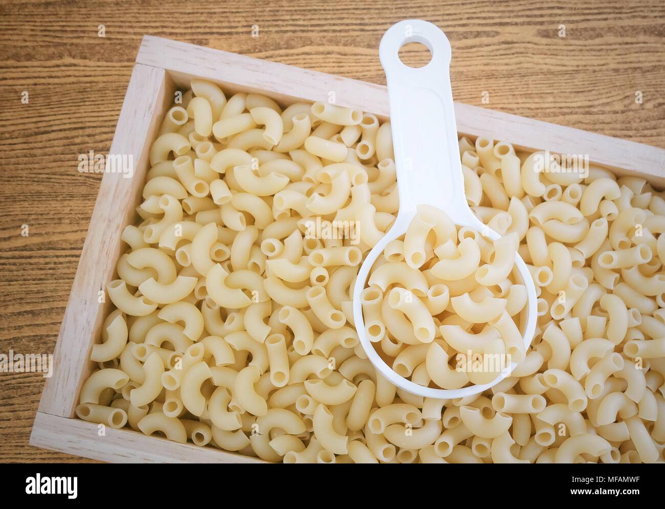 Food and Cuisine, Uncooked and Dried Elbow Macaroni or Gomiti Pasta in ...