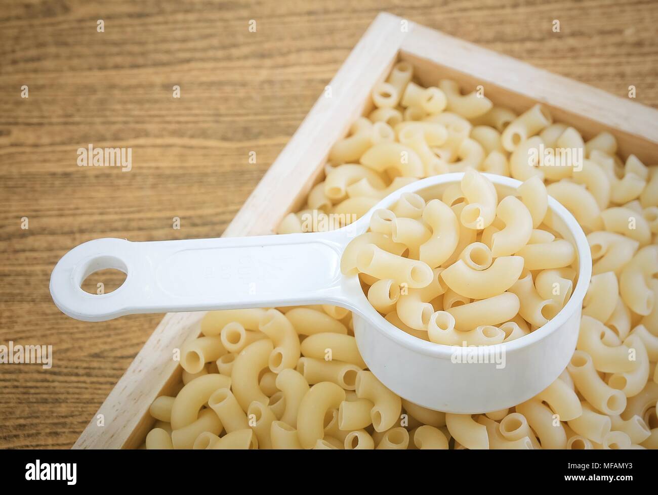 Food and Cuisine, Uncooked and Dried Elbow Macaroni or Gomiti Pasta in ...