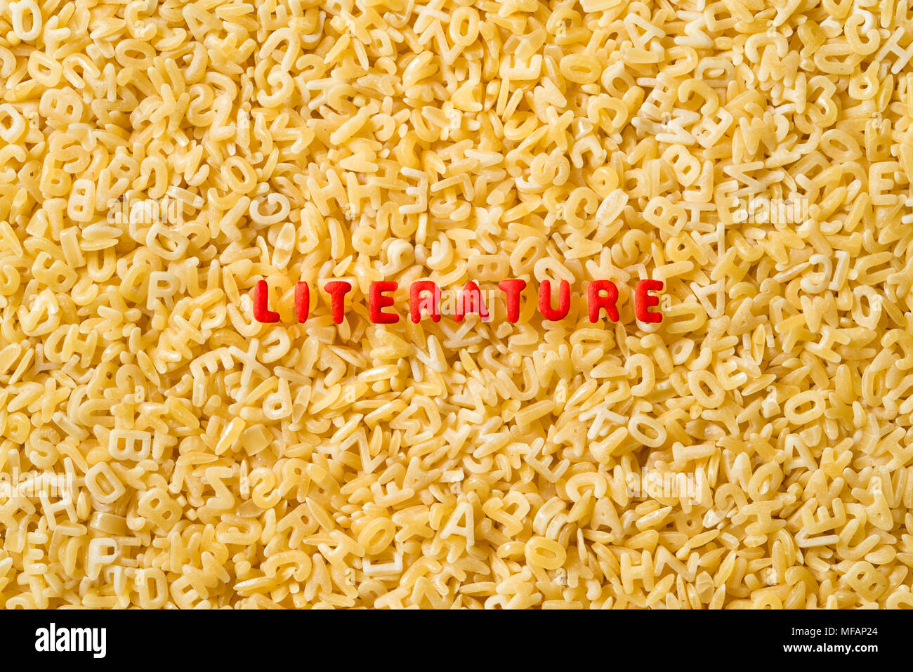 The words "soup of the day" are written with red colored abc pasta ...