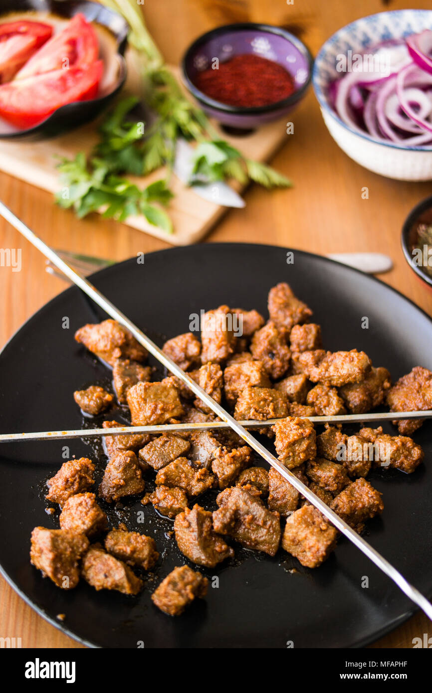 Arnavut Cigeri / Albanian liver on a wooden surface Stock Photo - Alamy