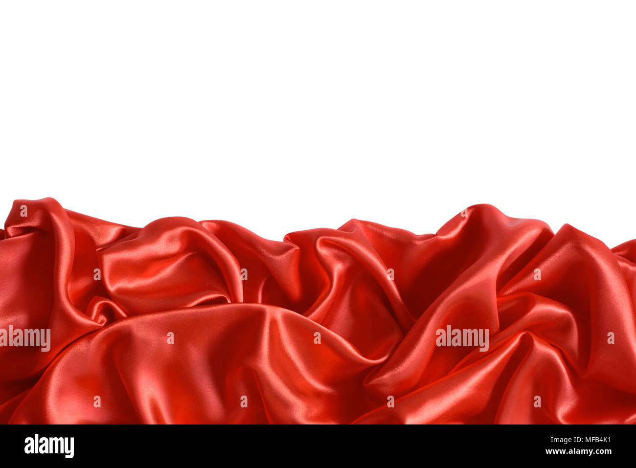 Close up of ripples in red silk fabric. Satin textile background with ...