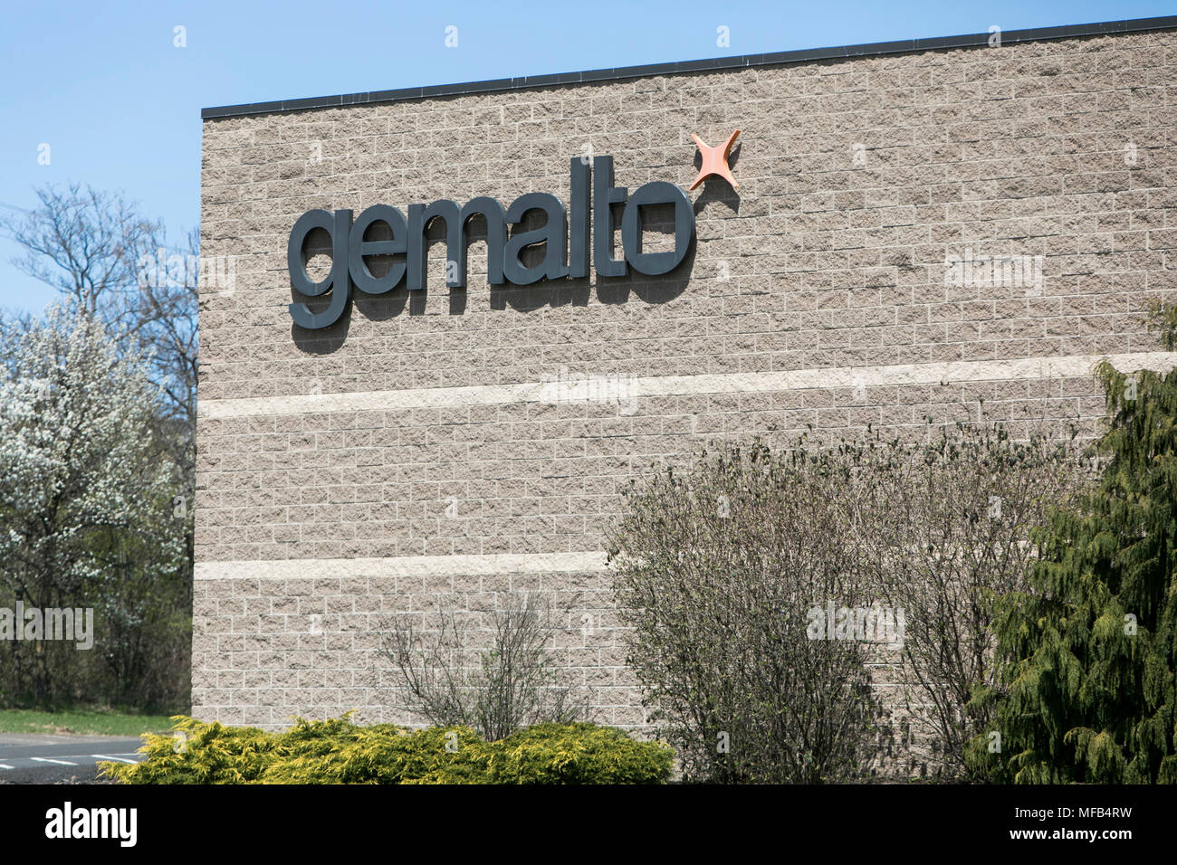 A logo sign outside of a facility occupied by Gemalto in ...
