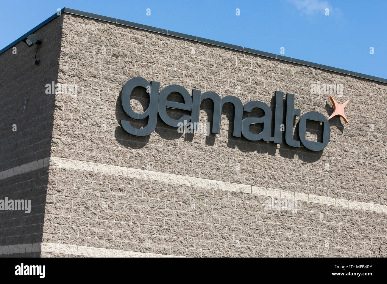 A logo sign outside of a facility occupied by Gemalto in ...