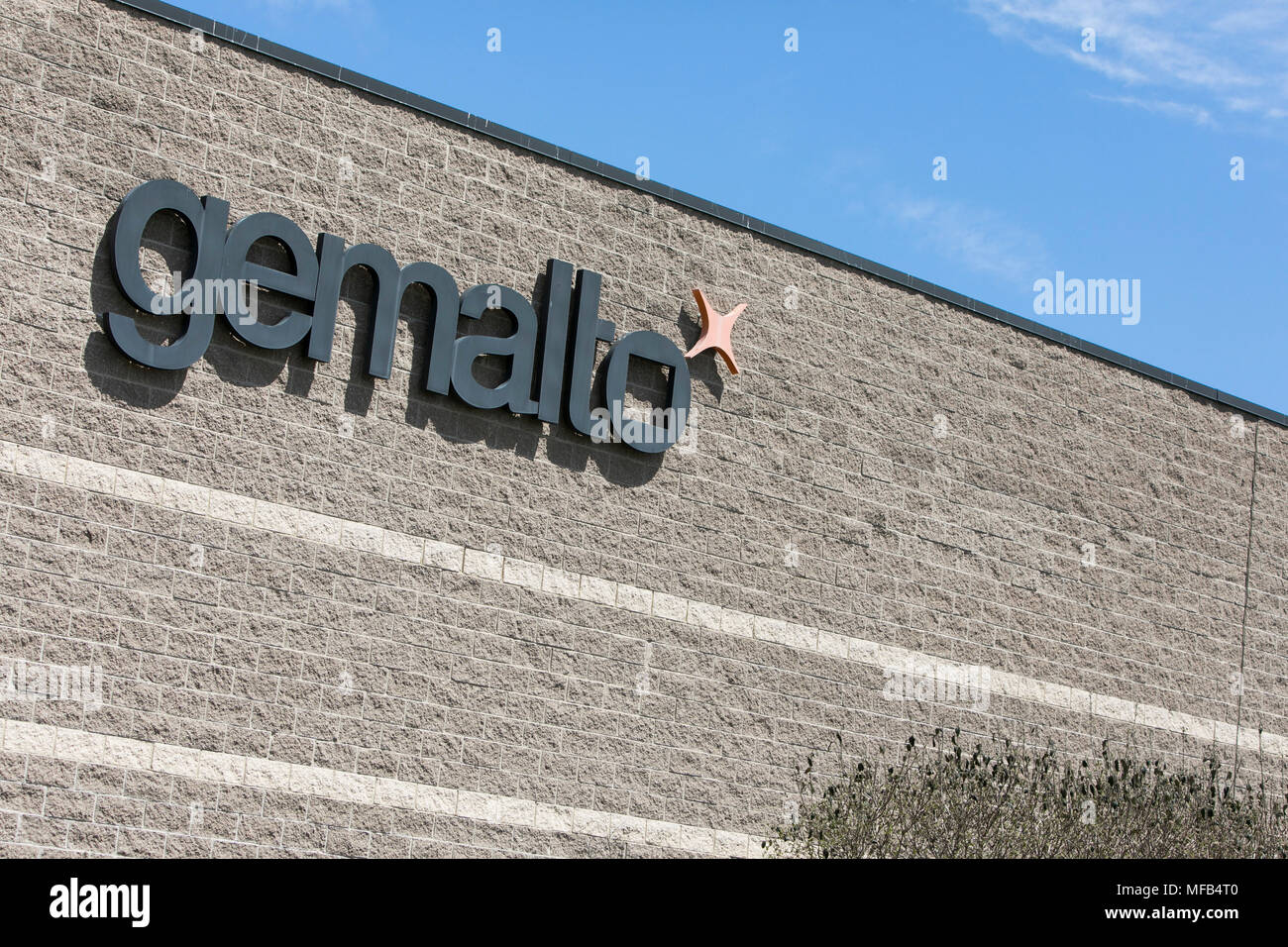 A logo sign outside of a facility occupied by Gemalto in ...