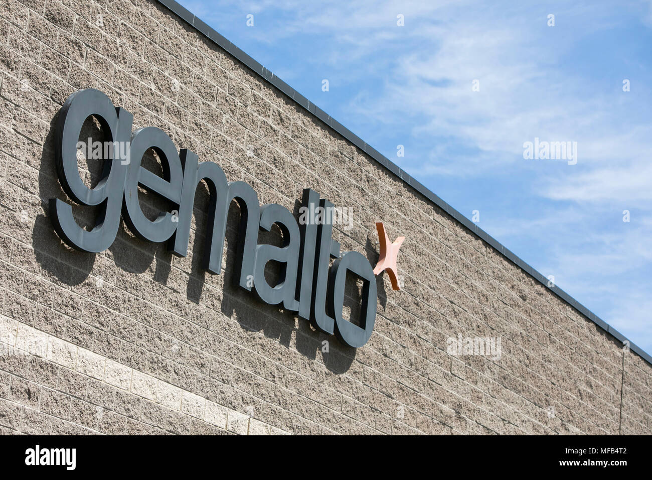 A logo sign outside of a facility occupied by Gemalto in ...
