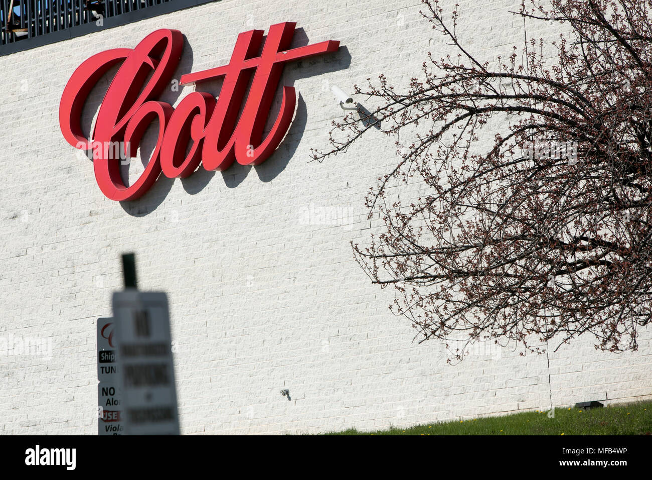 A logo sign outside of a facility occupied by the Cott Corporation in ...