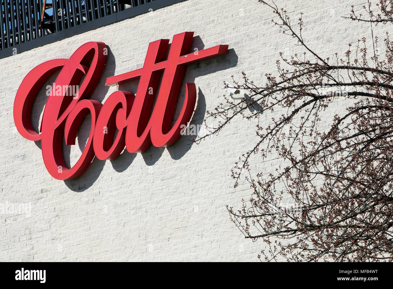 A logo sign outside of a facility occupied by the Cott Corporation in ...