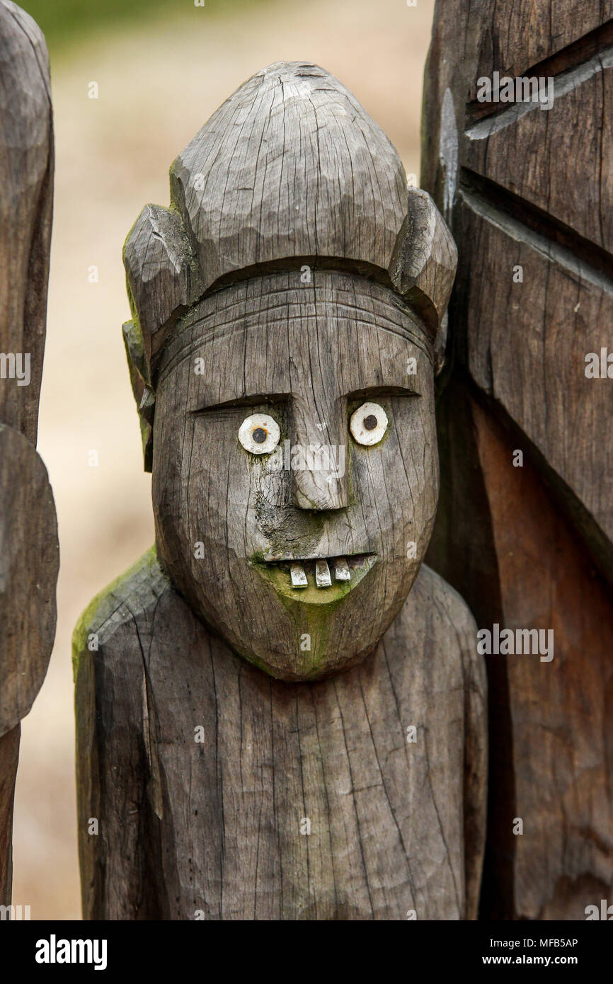 A traditional wooden African tribal statues. They look quite funny with ...
