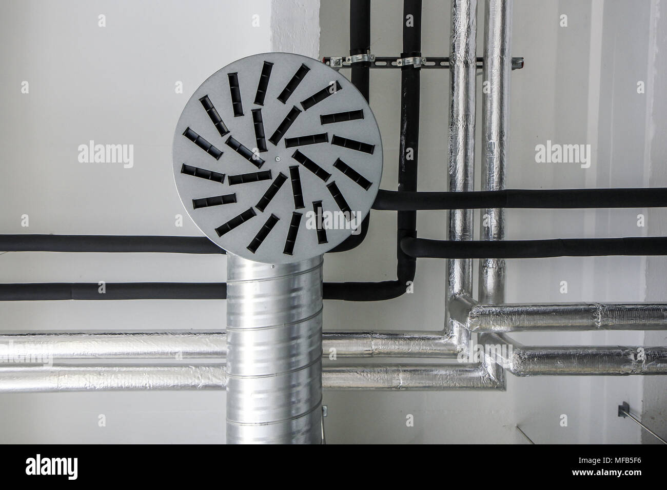 Ceiling construction air conditioning pipes hi-res stock photography ...