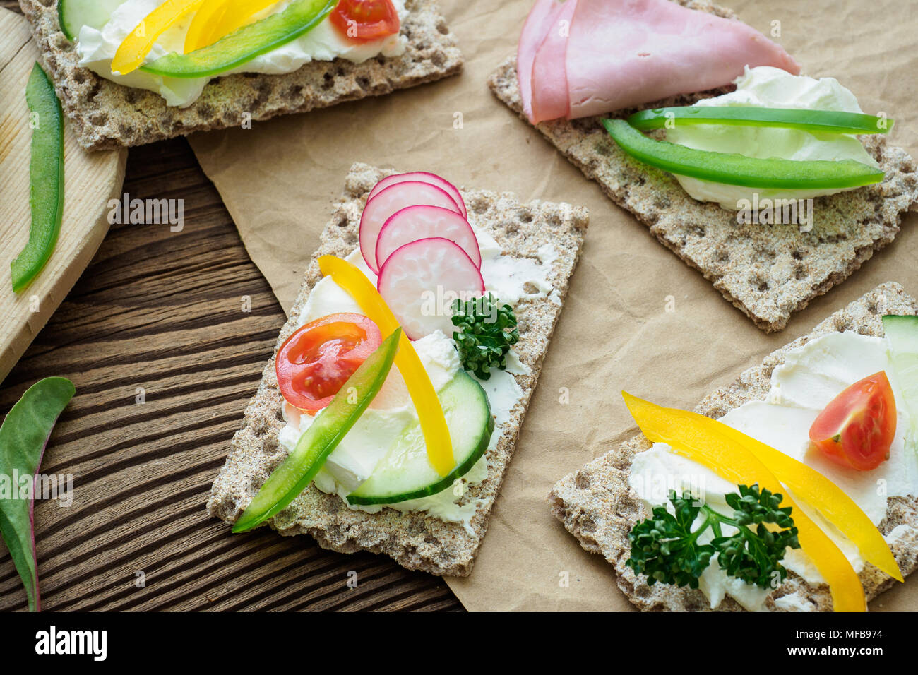 Healthy sandwiches with fresh vegetables. Breakfast toasts on wooden ...