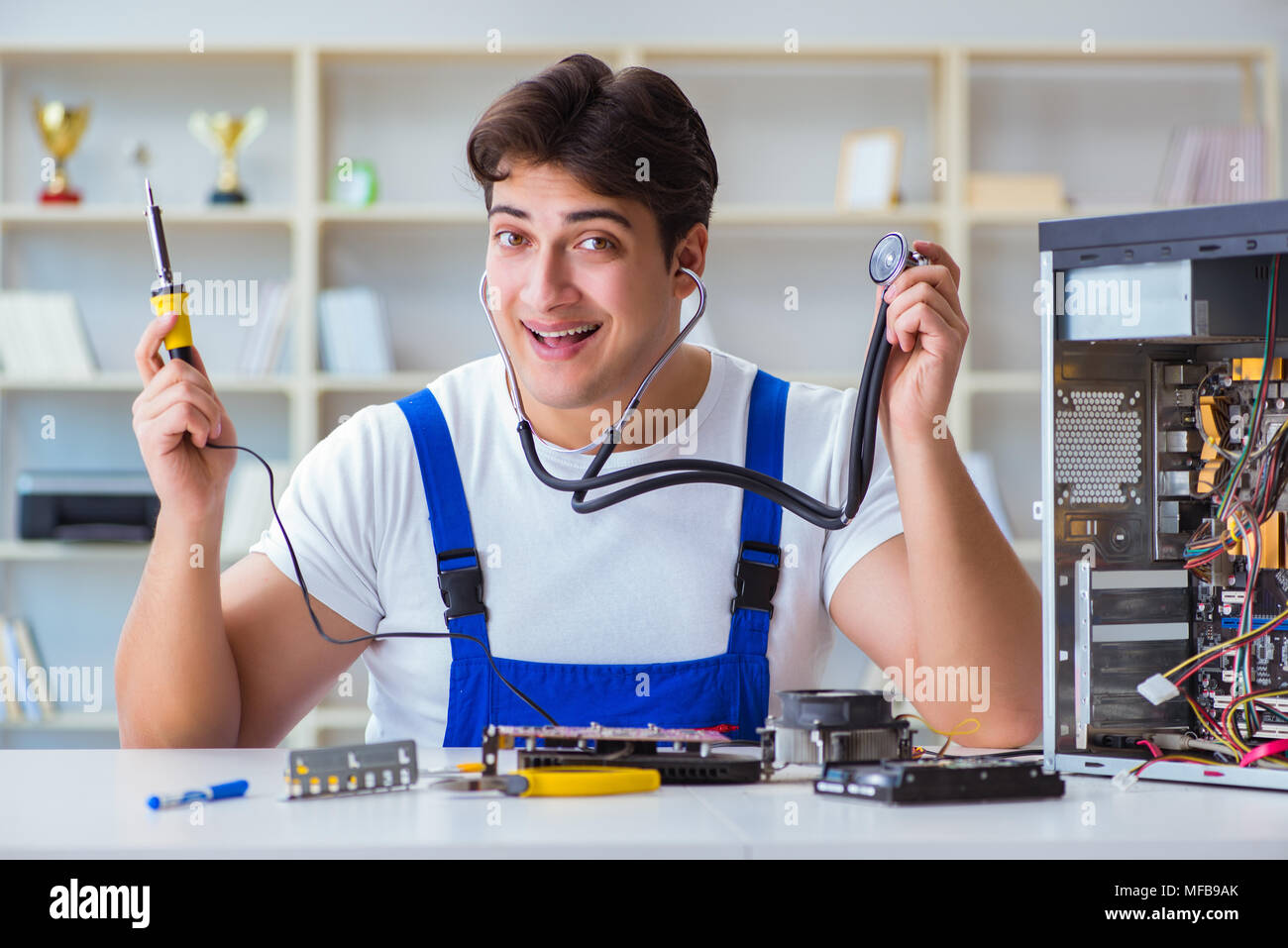 Computer hardware repair and fixing concept by experienced technician ...