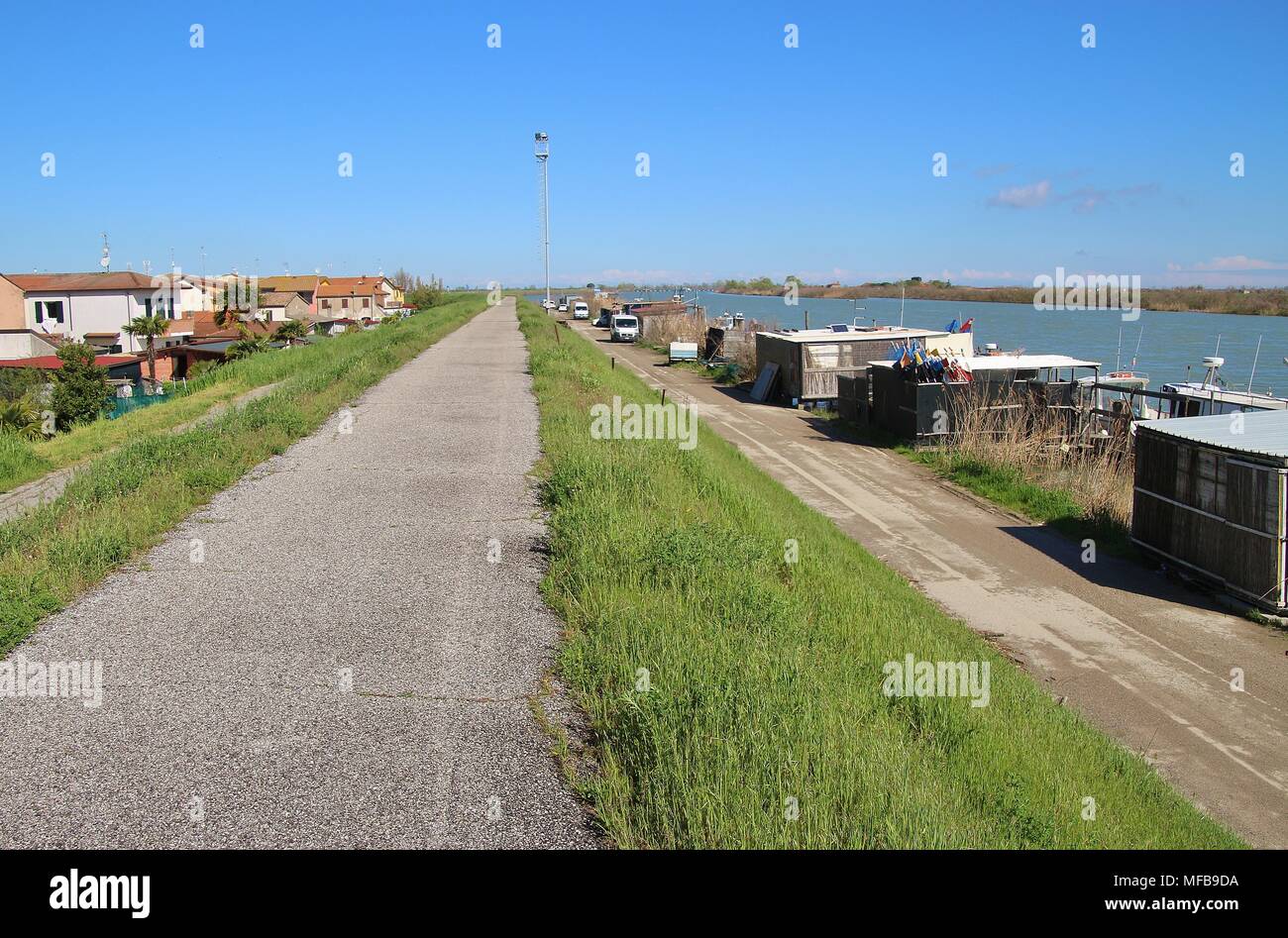 In the region Delta del Po. An arm of the Po river, Po di Goro, flows ...