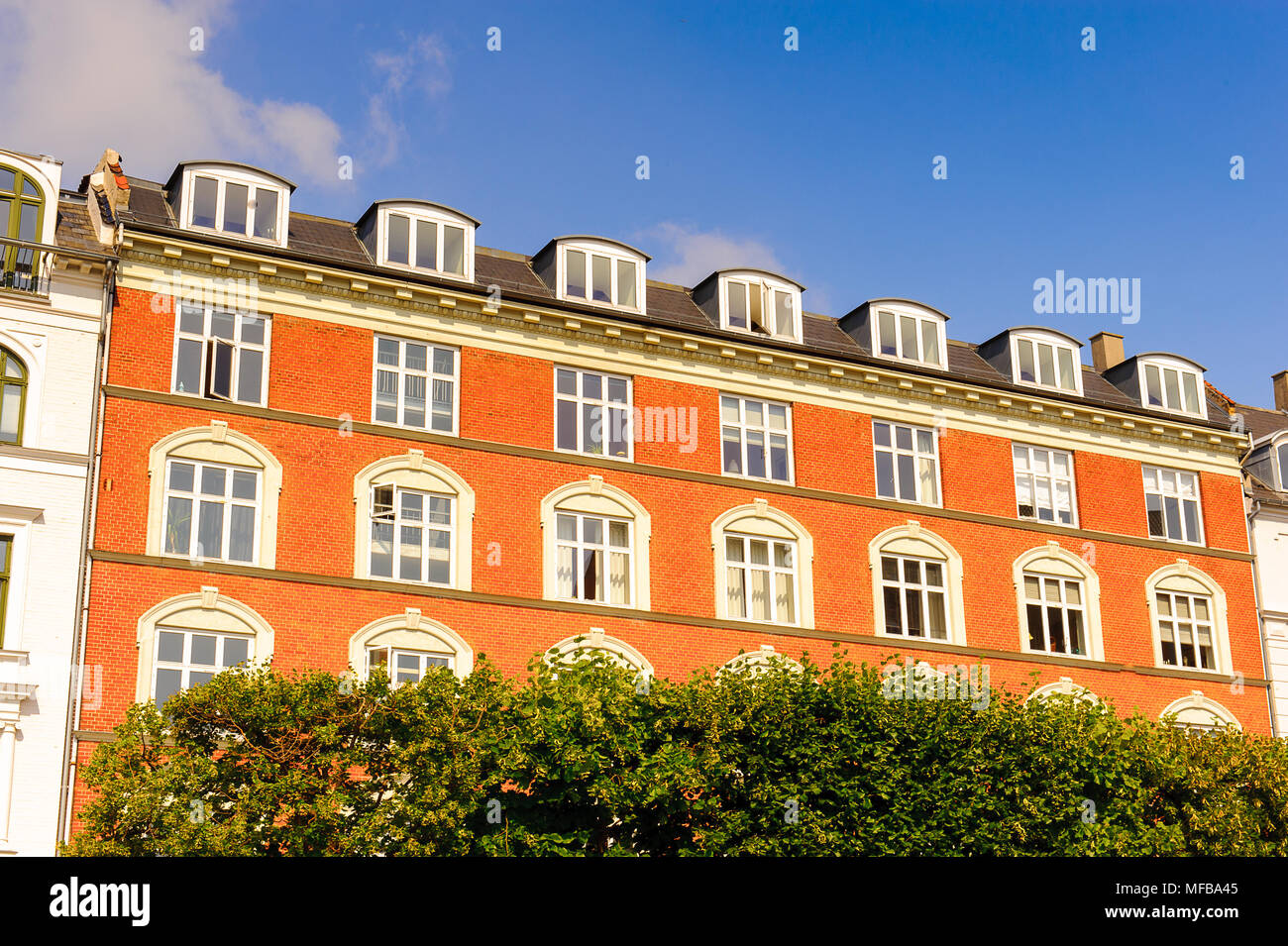 Red and white building in Copenhagen, Denmark Stock Photo - Alamy