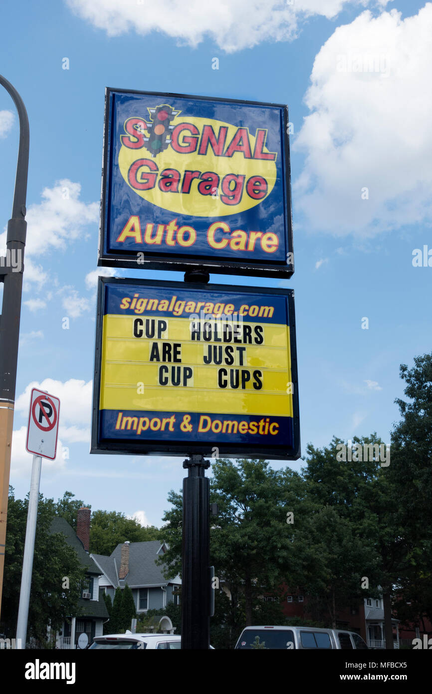 Signal Garage sign humor "Cup holders are just cup cups". St Paul ...