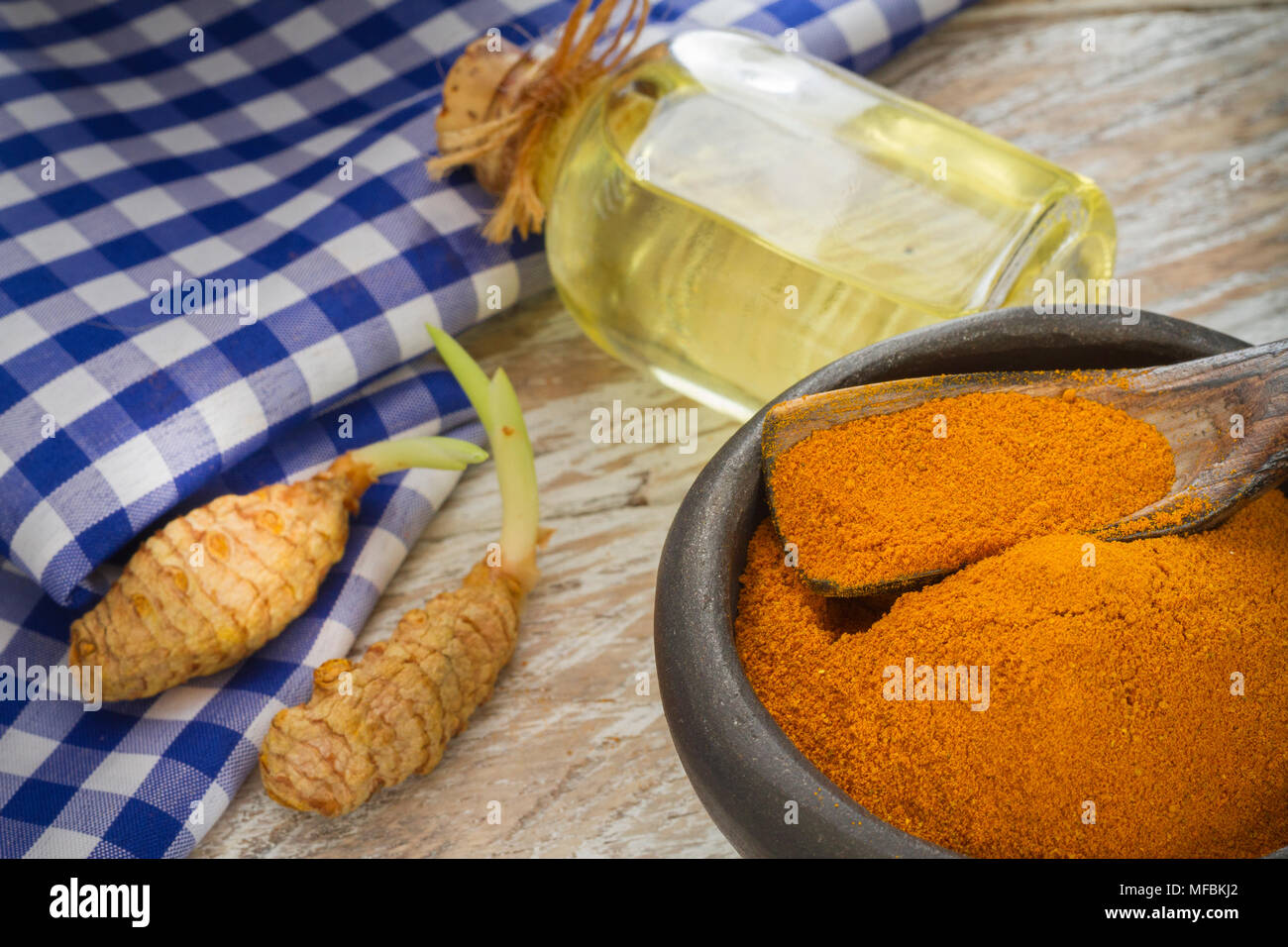 Ground turmeric in a bowl on wooden background- turmeric longa Stock ...