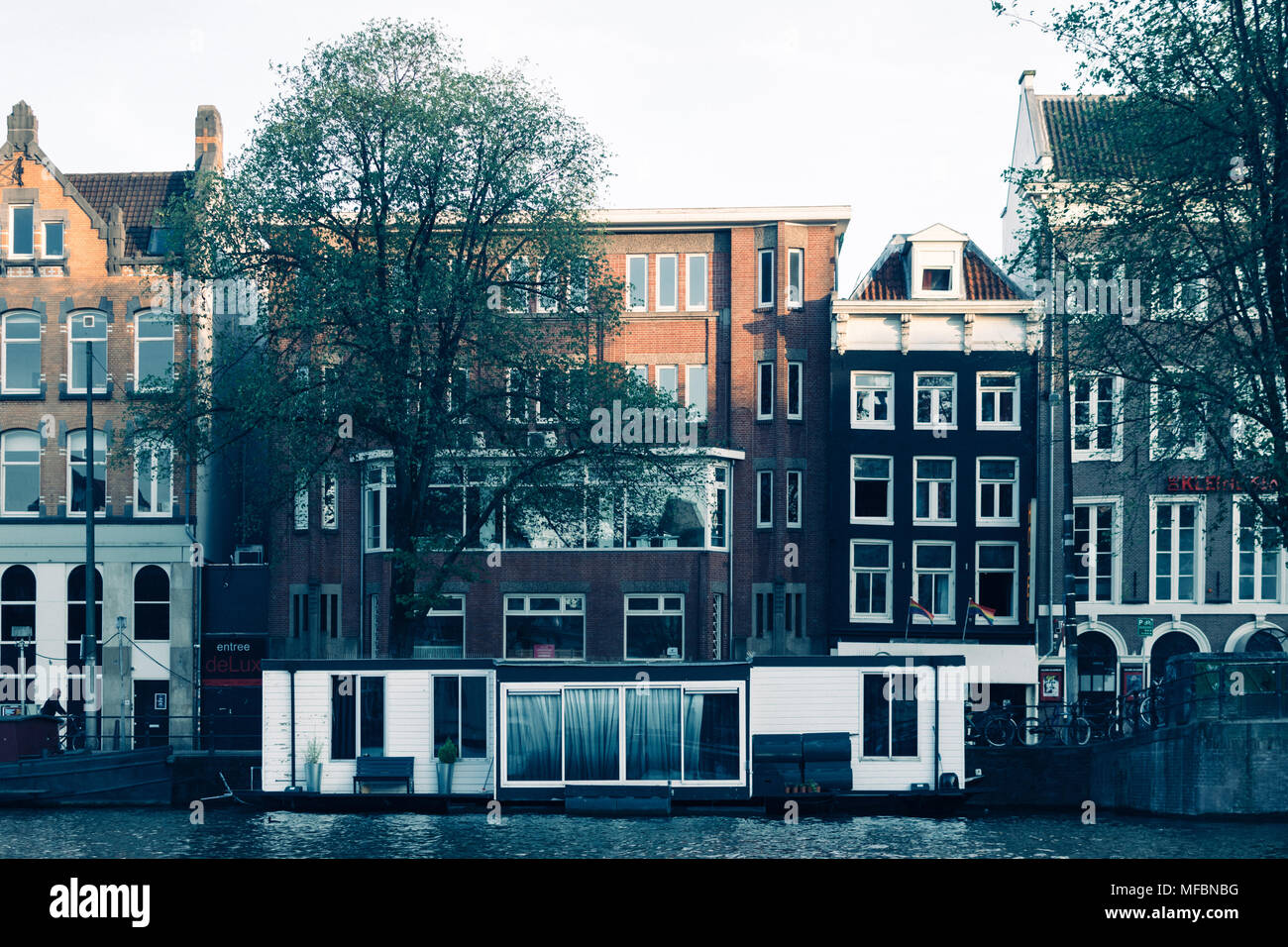 Floating house in Amsterdam, Netherlands Stock Photo - Alamy