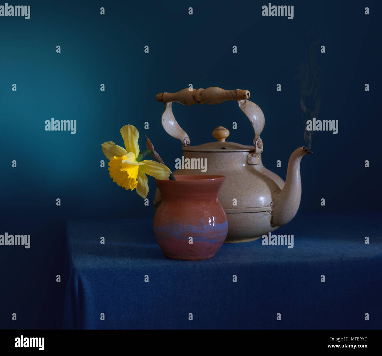 still life with a flower and a kettle. vintage Stock Photo - Alamy