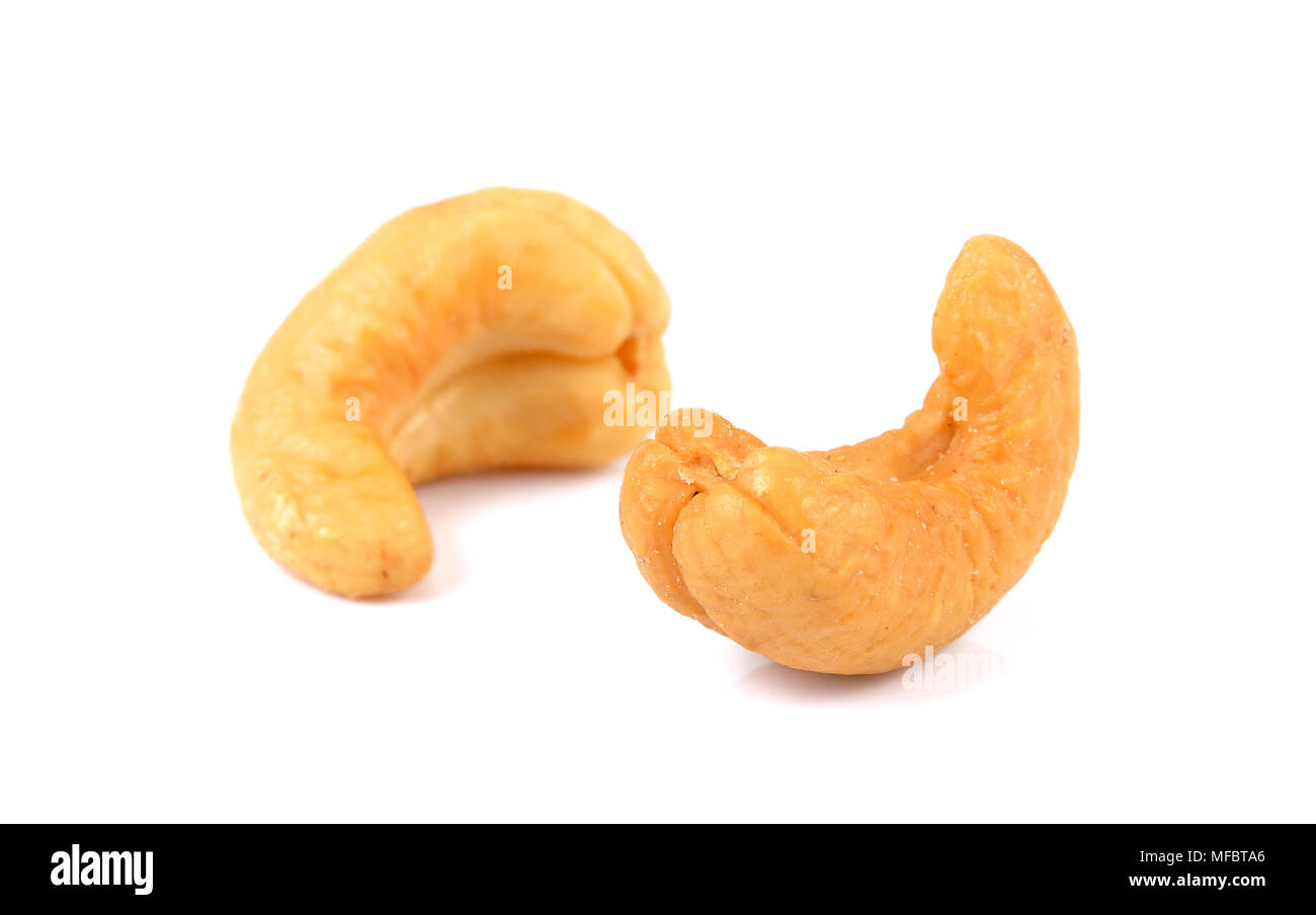 Fried cashew nut closeup isolated on white Stock Photo - Alamy