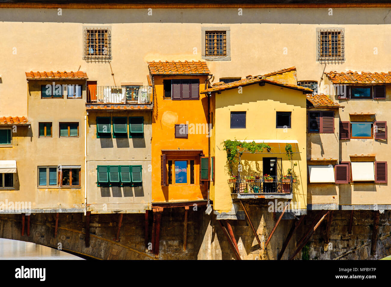 Close view of the Ponte Vecchio (Old Bridge), a Medieval stone closed ...