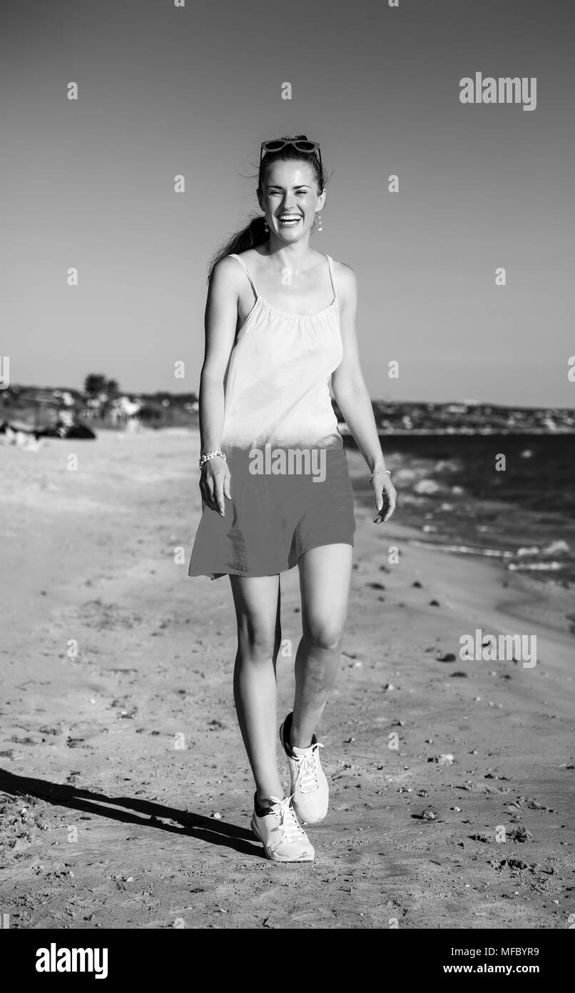 wonderfully cheerful mood. Full length portrait of happy active woman ...