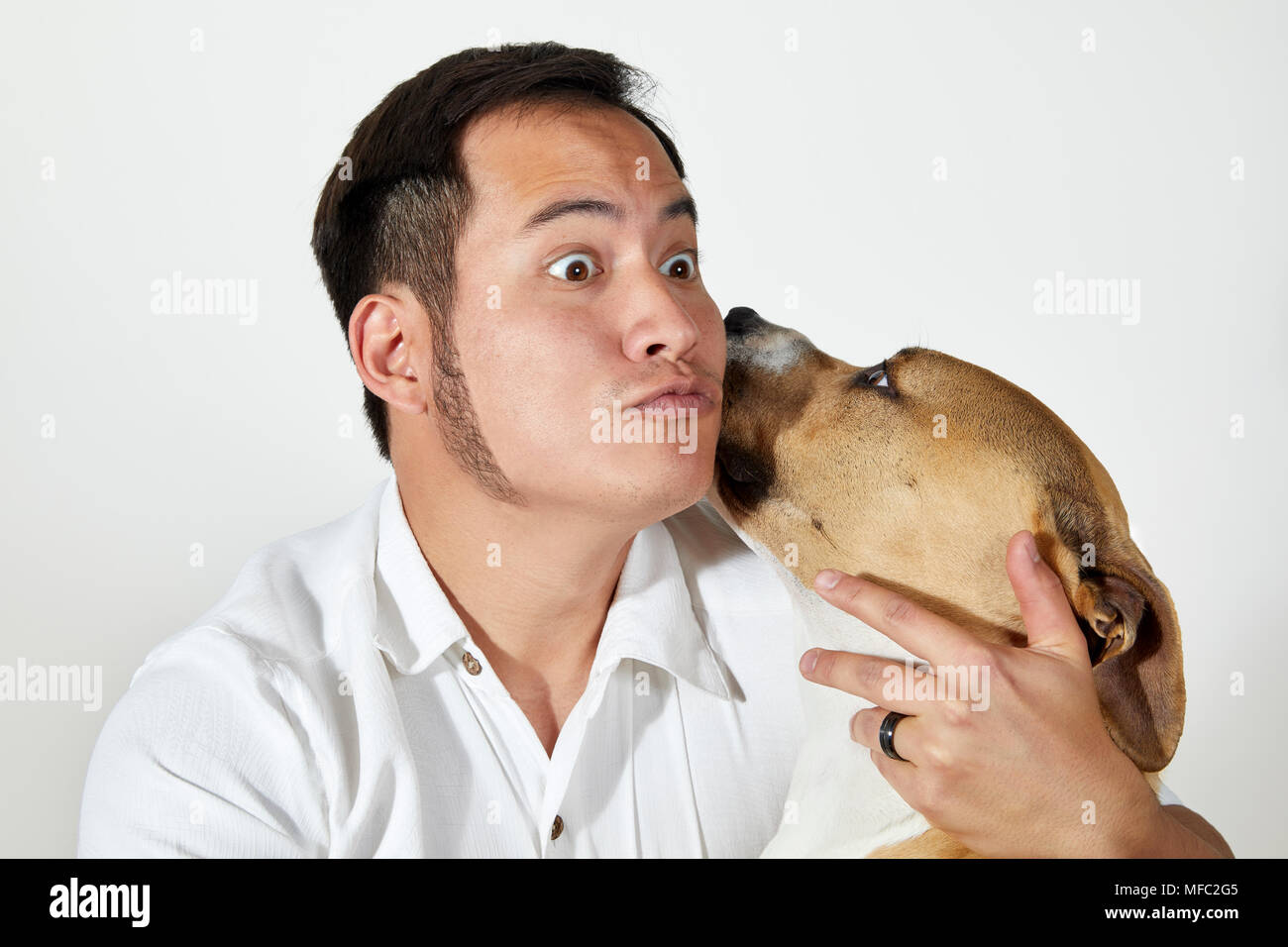 Whispering in ear hi-res stock photography and images - Alamy