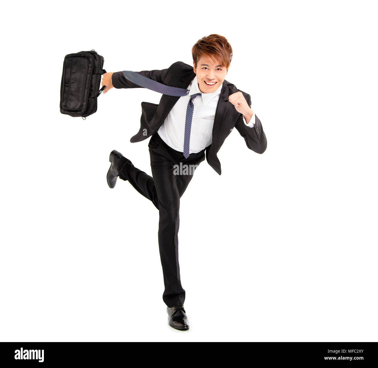 happy young business man running Stock Photo - Alamy