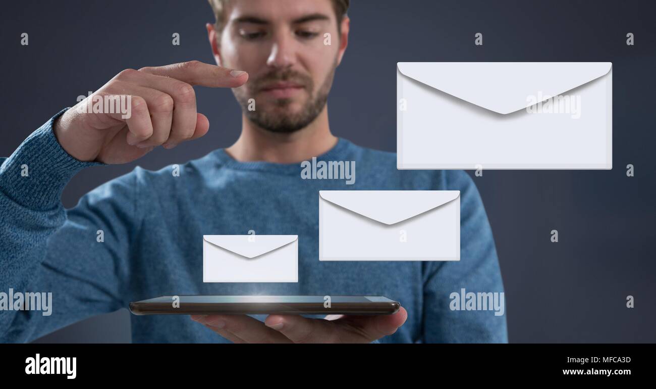 Envelope letter messages and man using tablet Stock Photo - Alamy