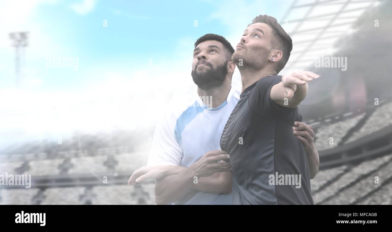 Soccer players in stadium Stock Photo - Alamy