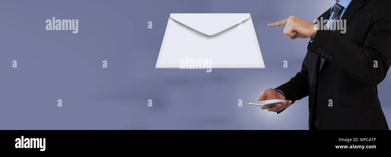 Envelope letter message and man using tablet Stock Photo - Alamy