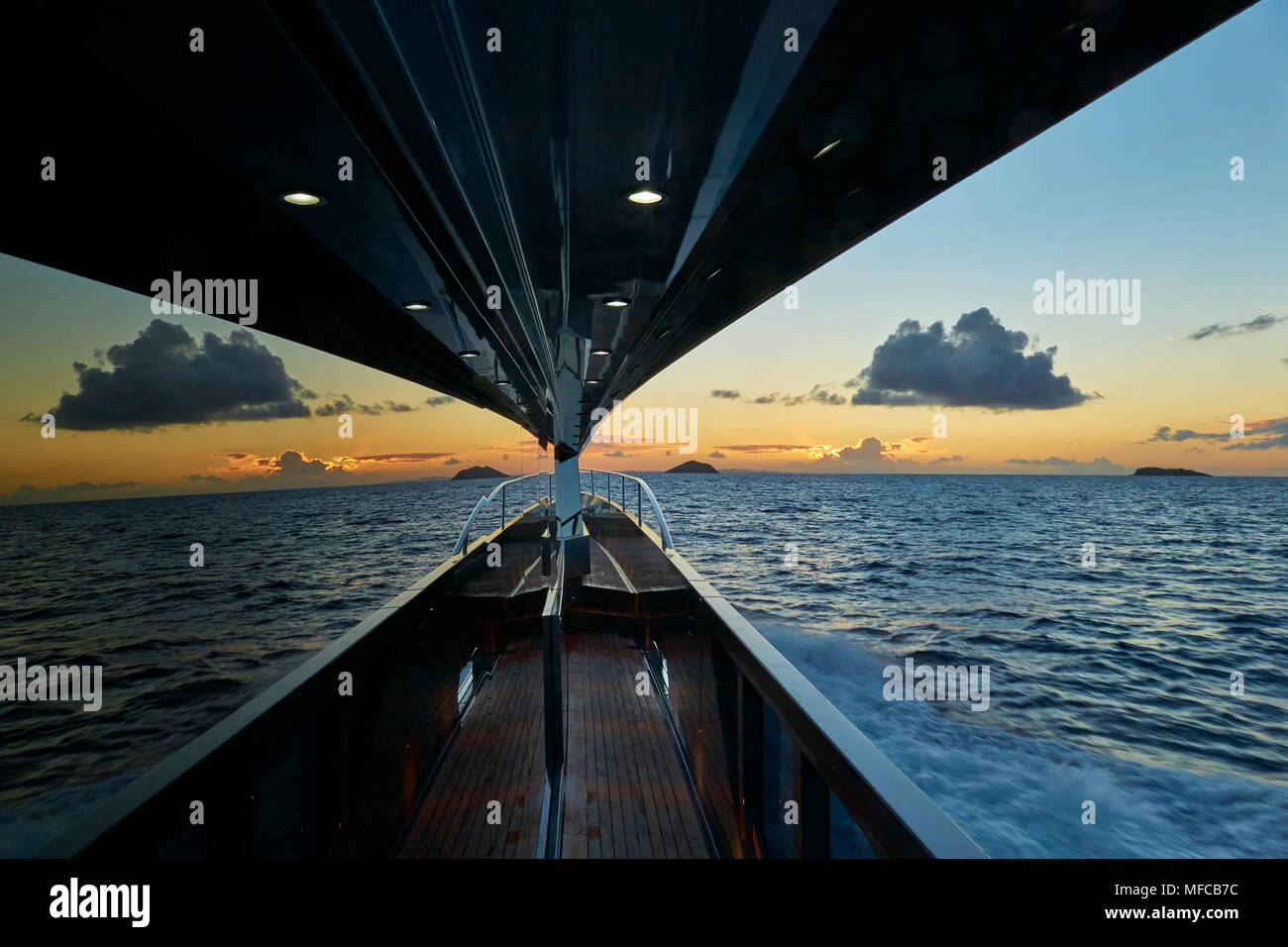 Powerboat at sunset hi-res stock photography and images - Alamy
