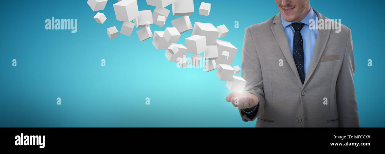 Composite image of businessman presenting object Stock Photo - Alamy
